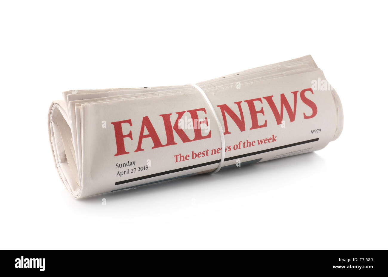 Rolled newspapers on white background Stock Photo - Alamy