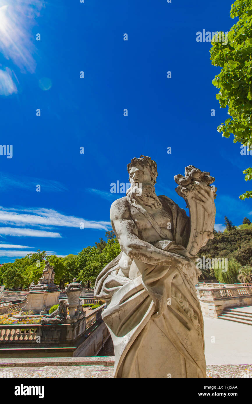 Statue of divinity holding a cornucopia from Les Jardins de La Fontaine ...