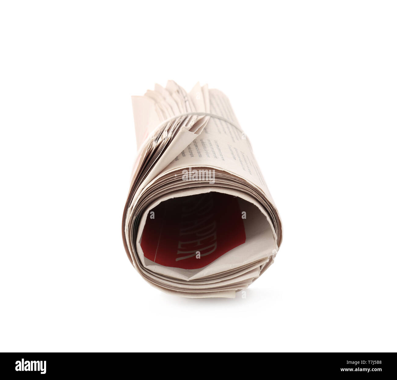 Rolled newspapers on white background Stock Photo - Alamy