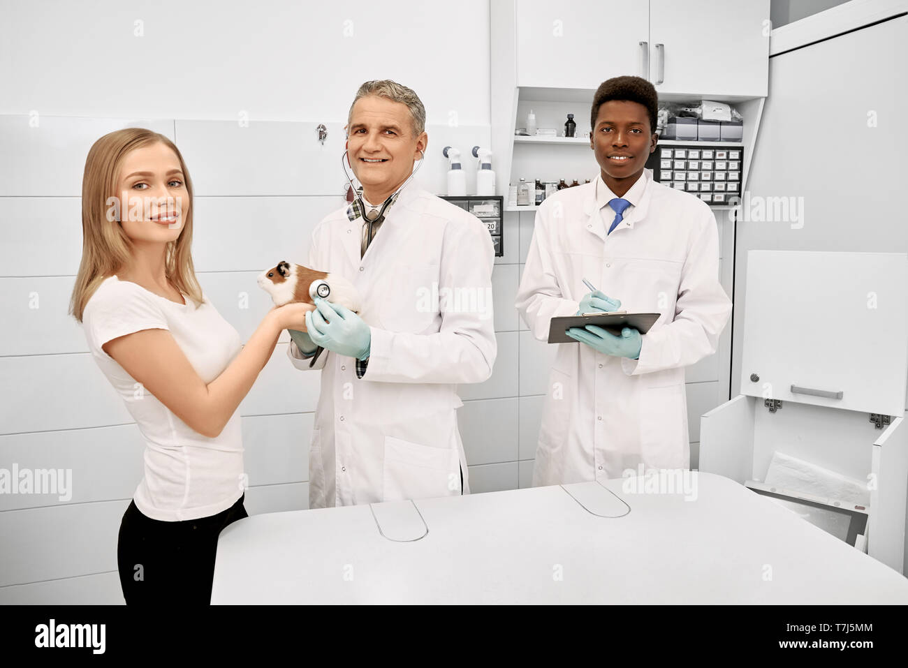 Three men posing in the uniform hi-res stock photography and images - Alamy