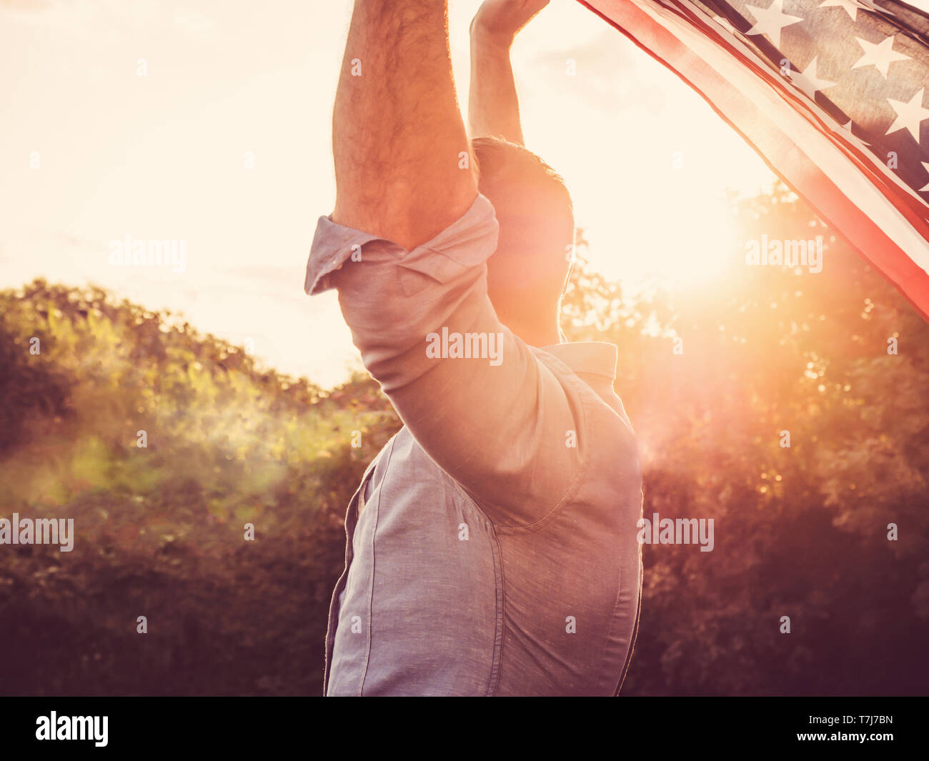 Man male waving flag hi-res stock photography and images - Alamy
