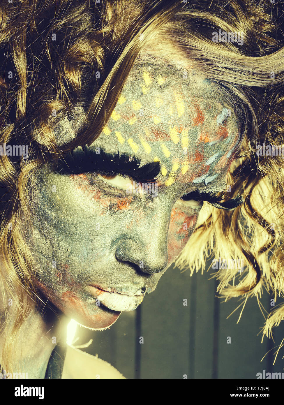 Woman with paited face Stock Photo - Alamy