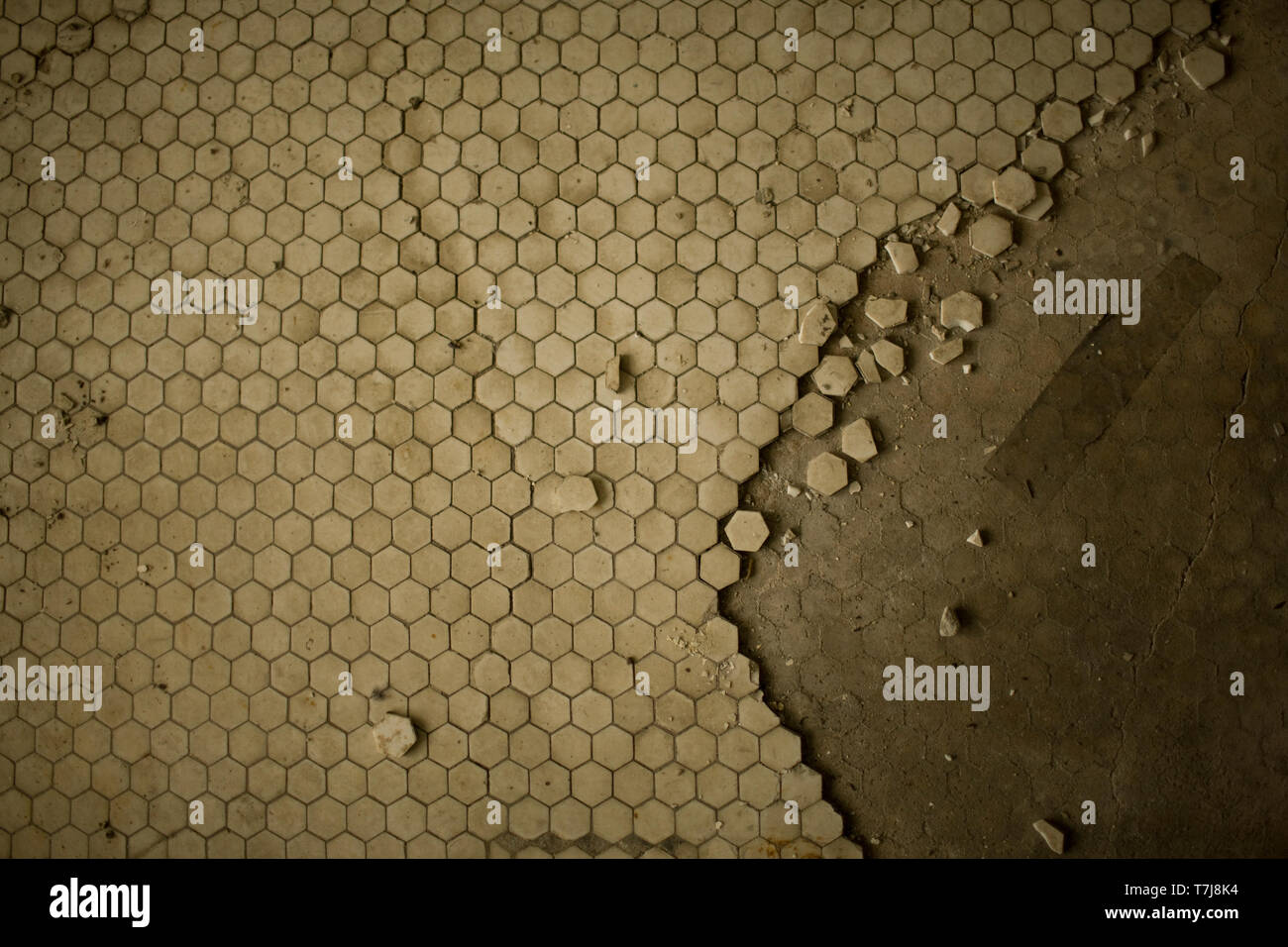Crumbling floor tiles Stock Photo - Alamy