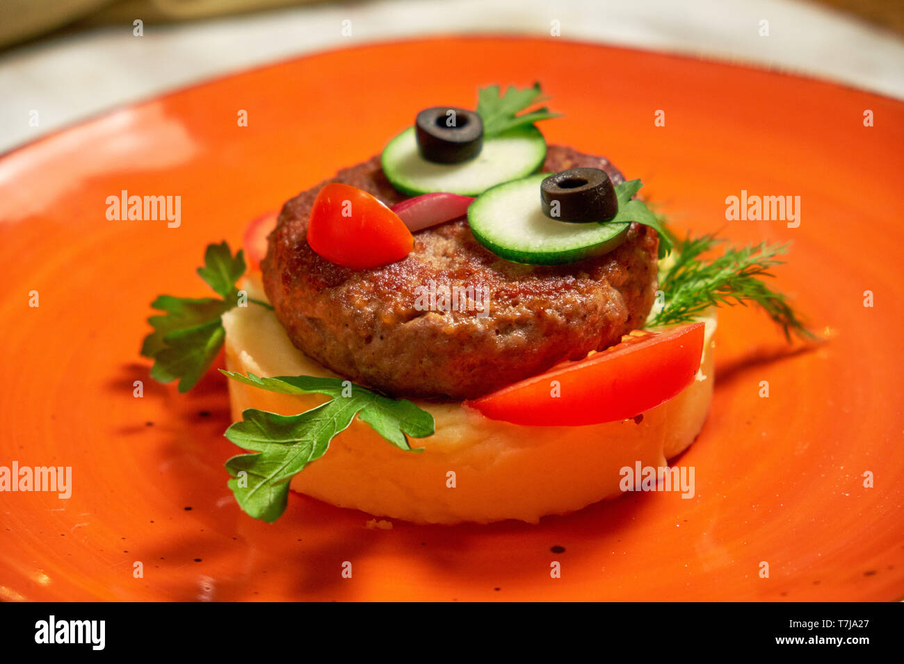 The restaurant serves a dish on the children's menu. Potato puree with ...