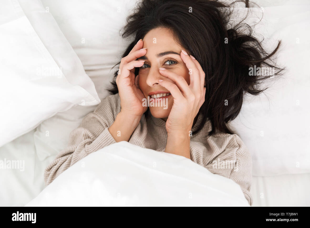 Woman in bed alone happy above hi-res stock photography and images - Alamy