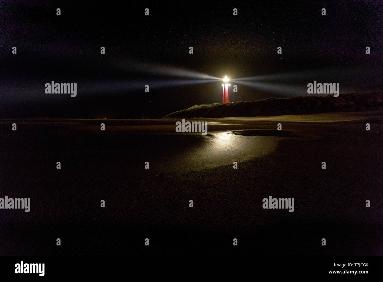 Lighthouse of Dutch Wadden Island Texel during the night, with night ...