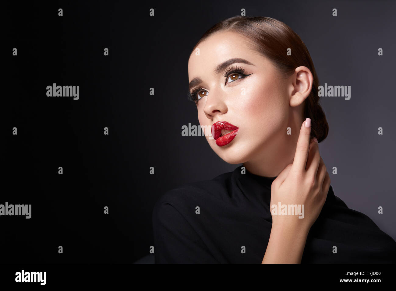 Make up model at black background Stock Photo - Alamy