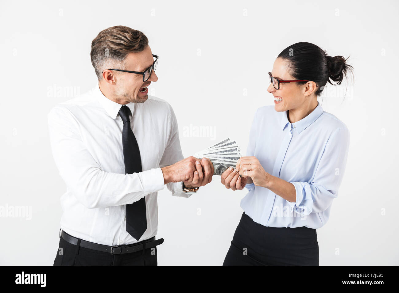 Couple of colleagues wearing formal clothing standing isolated over ...