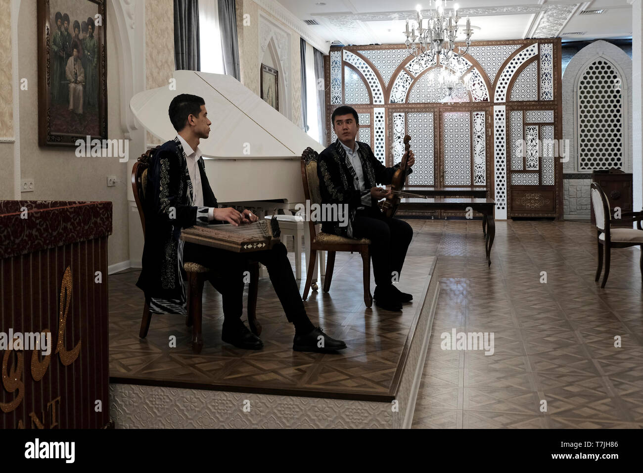 Musicians playing traditional Uzbek musical instruments at the ...
