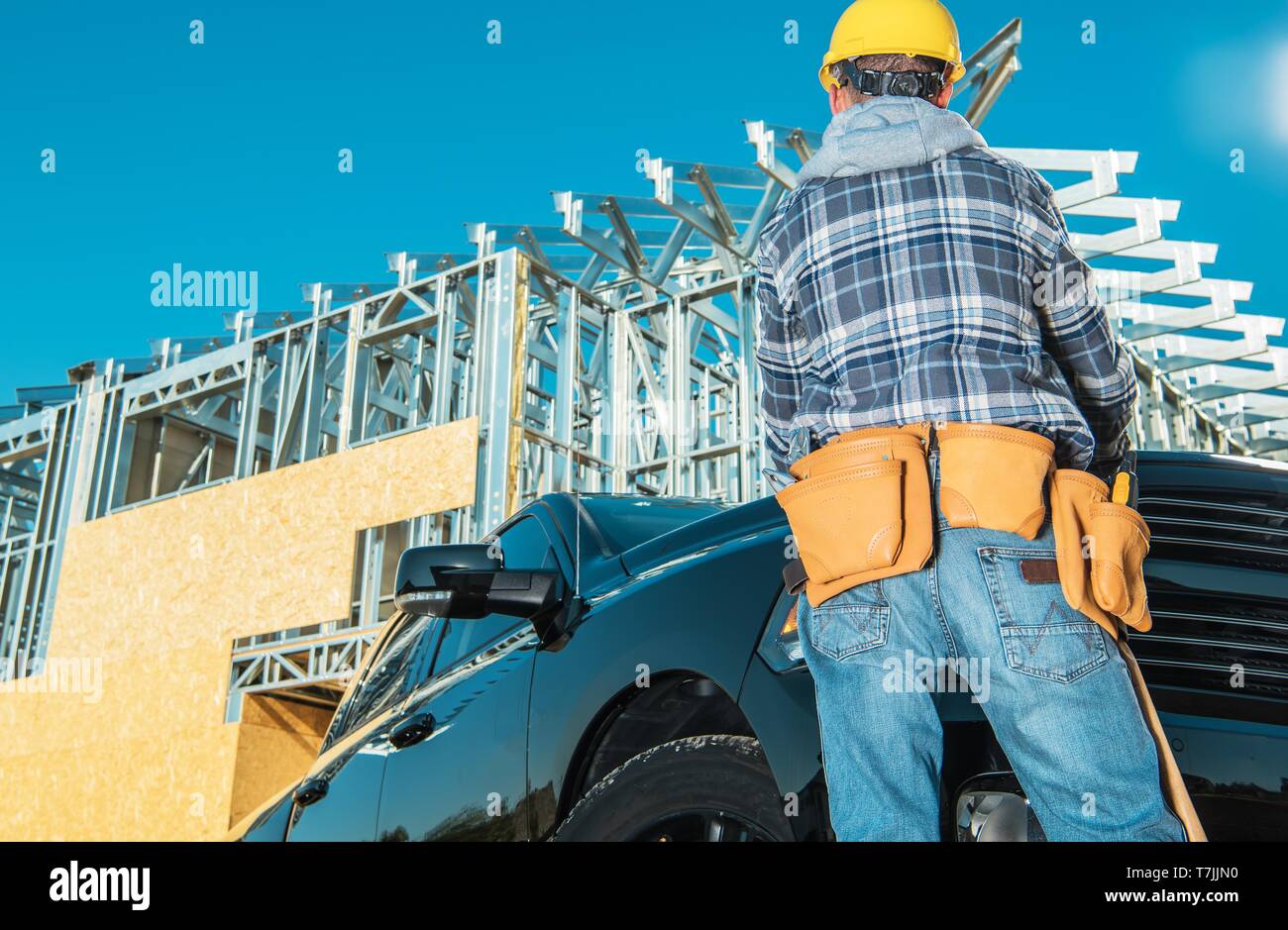 Construction Contractor Job. Caucasian Worker in Front of Skeleton ...