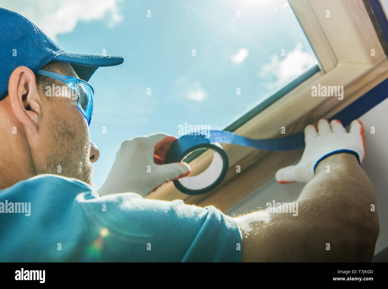 Securing Window Frame Using Masking Tape Before Room Painting ...