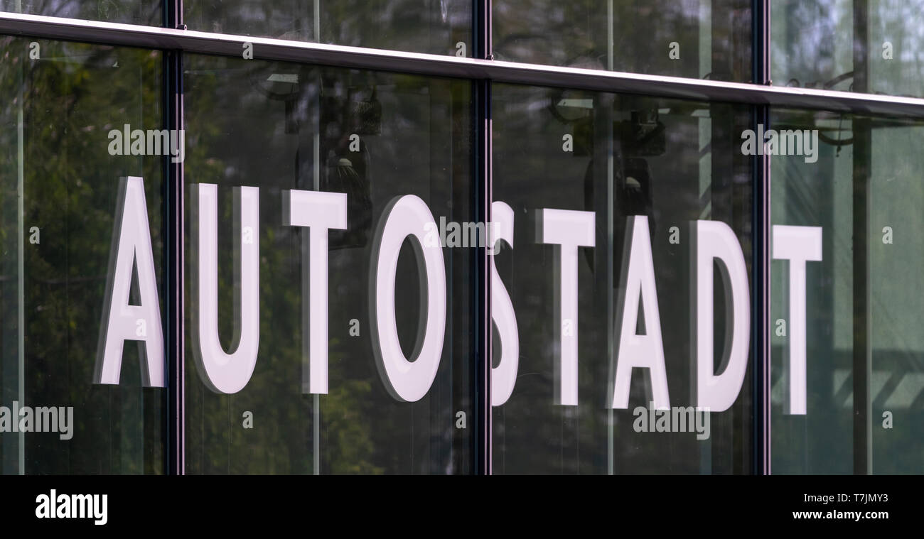 The Volkswagen VW Autostadt logo and lettering on the windows of the ...