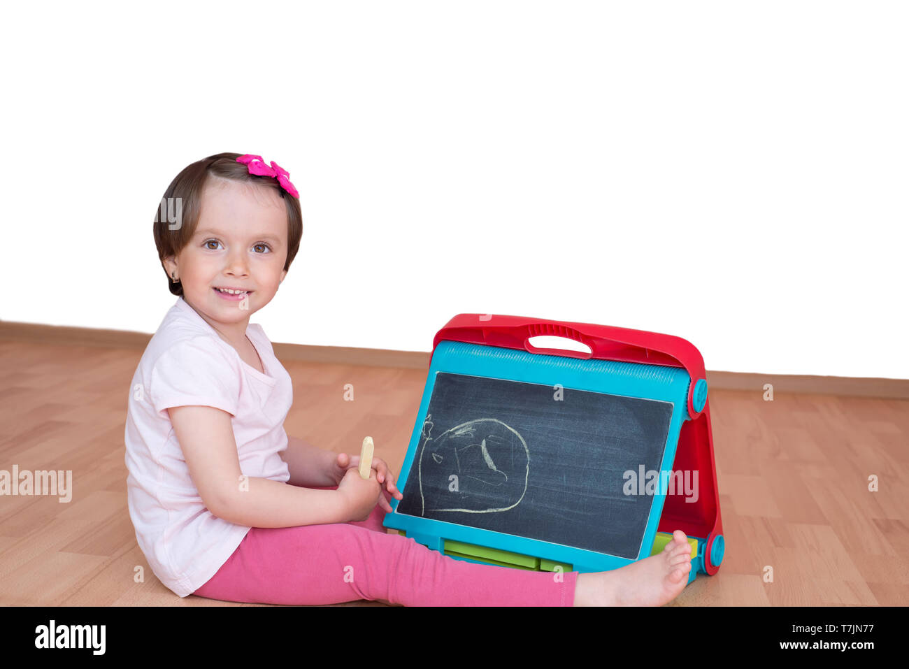 Little girl with chalk and blackboard isolated Stock Photo - Alamy