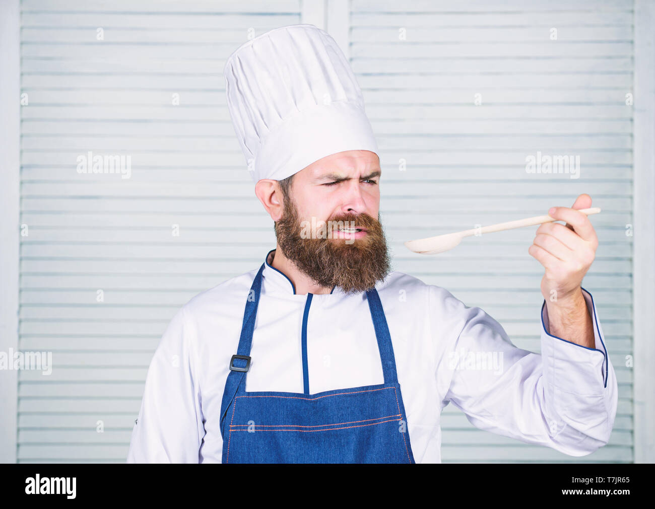 Bearded man cook in kitchen, culinary. Dieting and organic food ...
