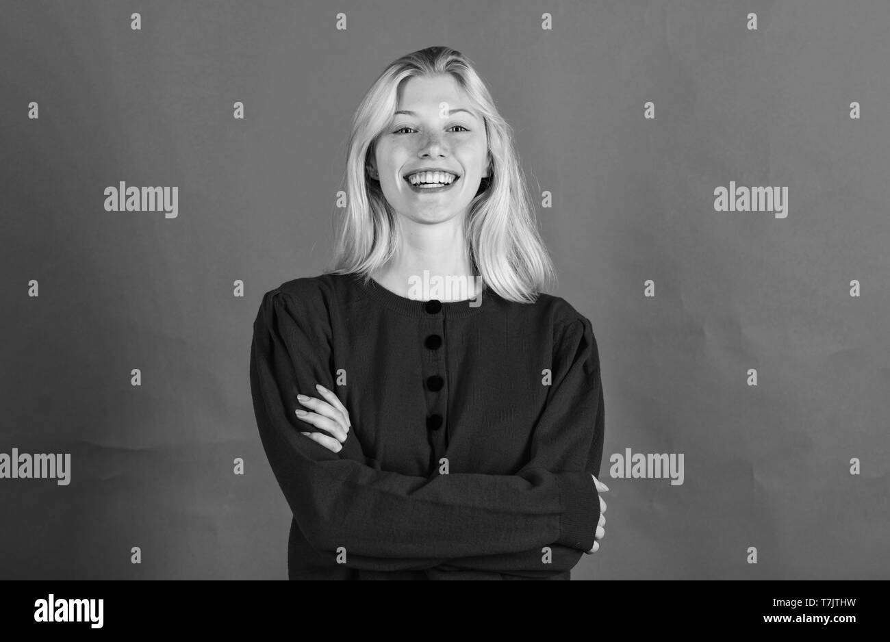 Brilliant smile concept. Girl blonde happy smiling face over red ...