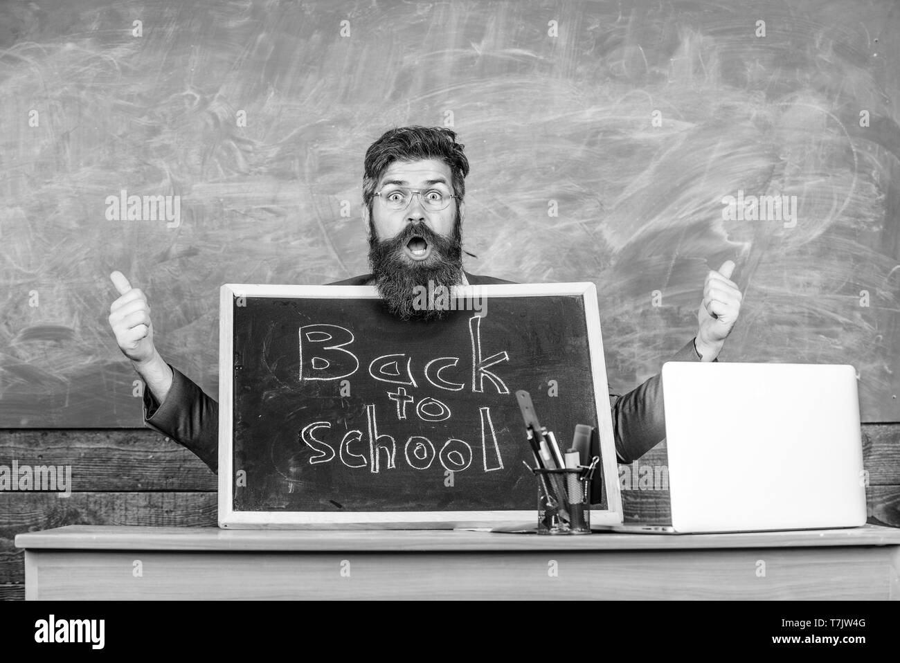 Beginning of new school year in september. Teacher welcomes new pupils ...