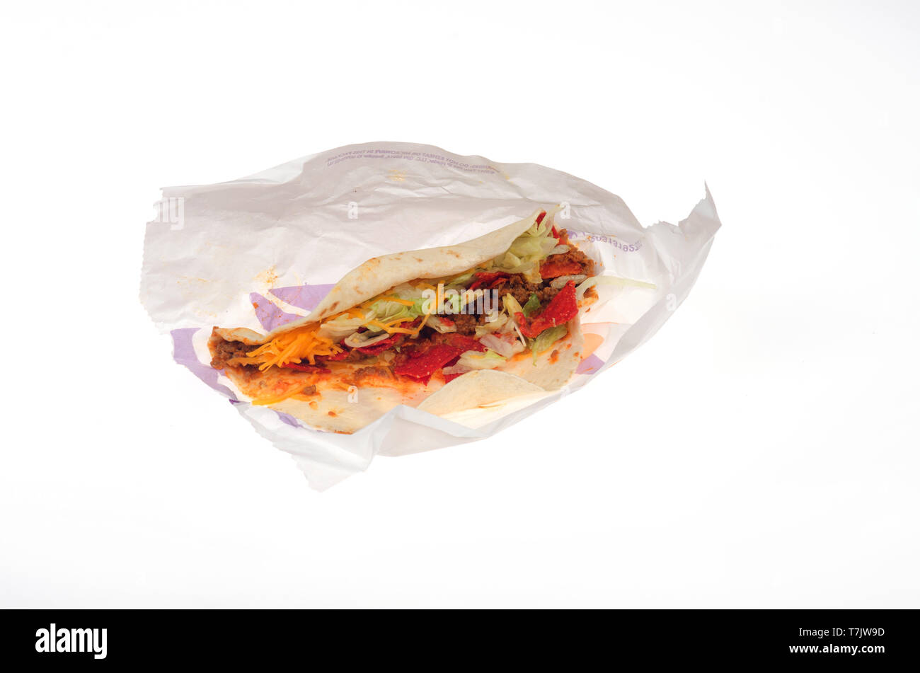 Taco Bell spicy soft taco on wrapper Stock Photo - Alamy