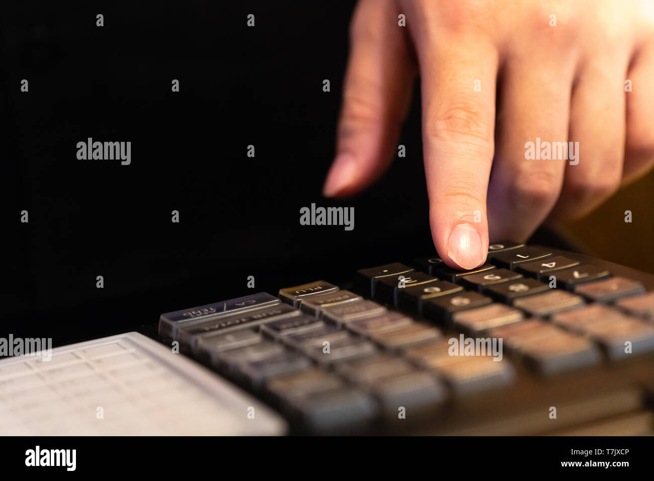 cash register installed on counter for accepting order from customer ...