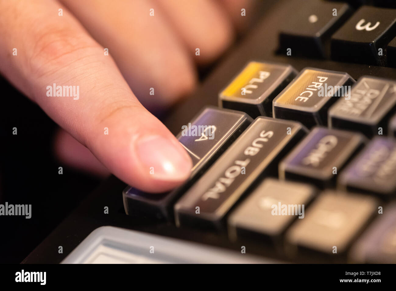 cash register installed on counter for accepting order from customer ...