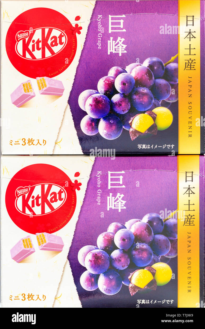 Exterior of two Japanese souvenir carton boxes of Kyoho grape flavour ...