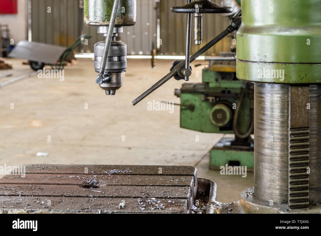 Industrial metal drilling tool in factory Stock Photo - Alamy