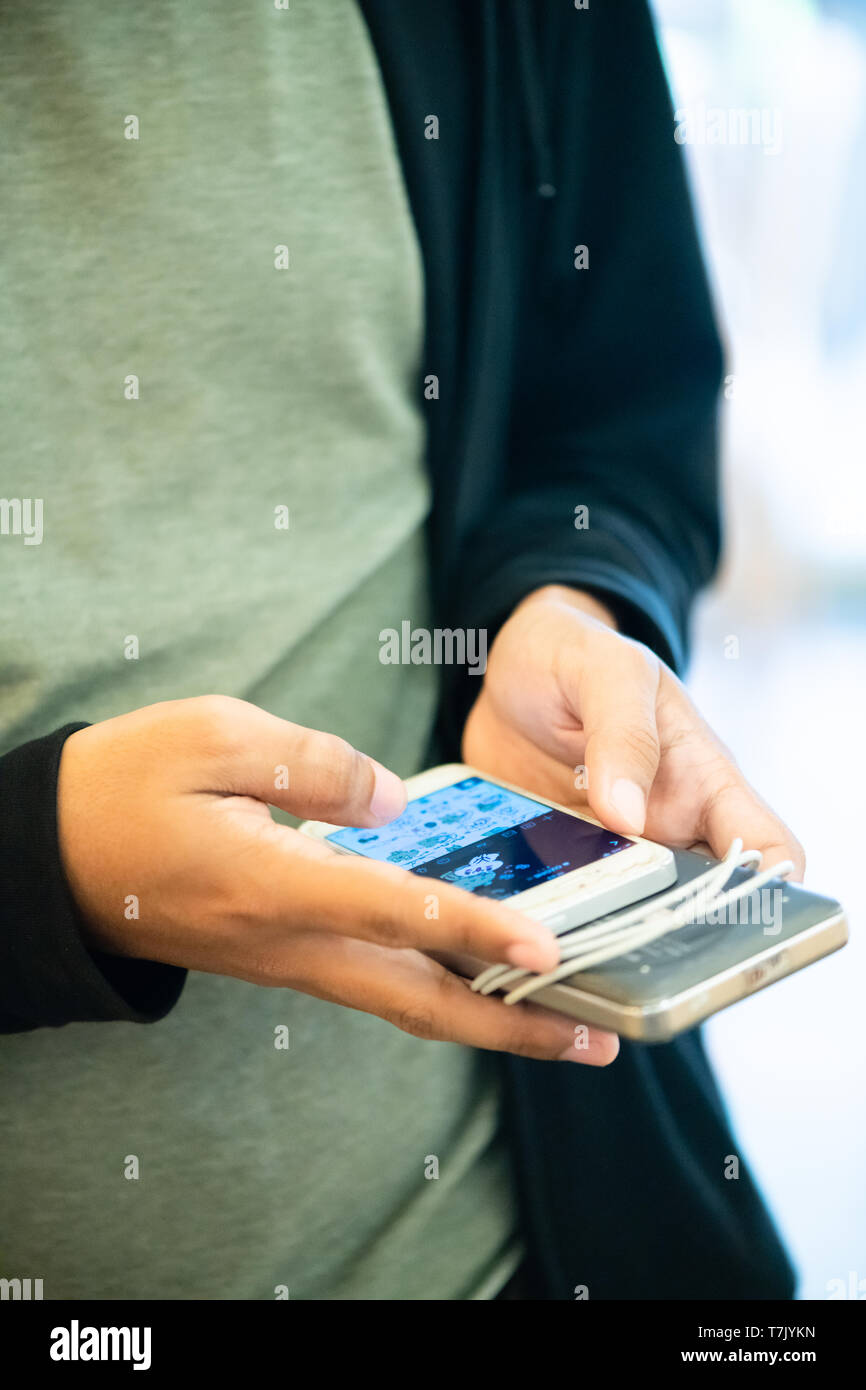 people surfing browsing the web on smart phone.people enjoy with game ...