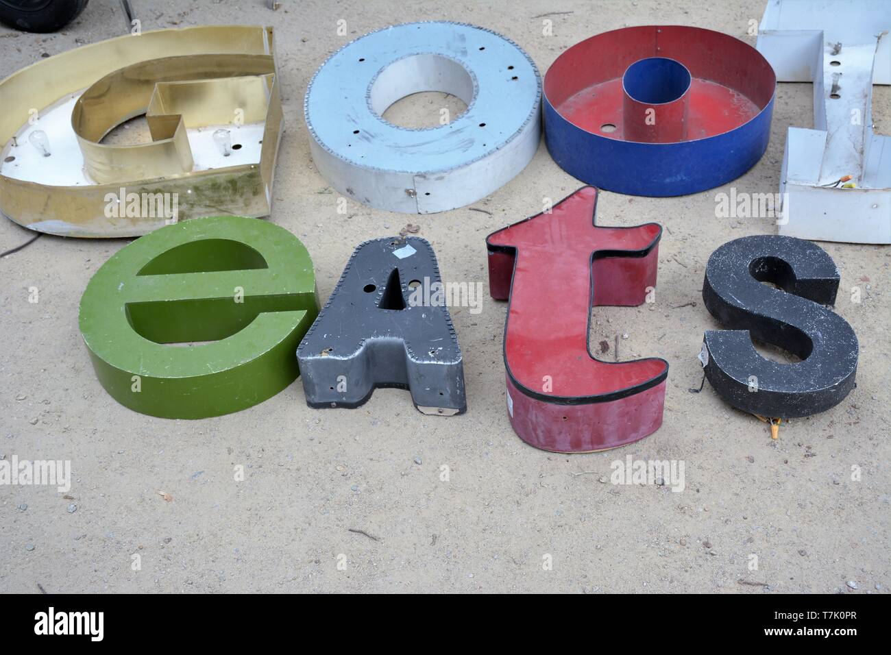 Letters from old business signs spelling out Good Eats as in the ...