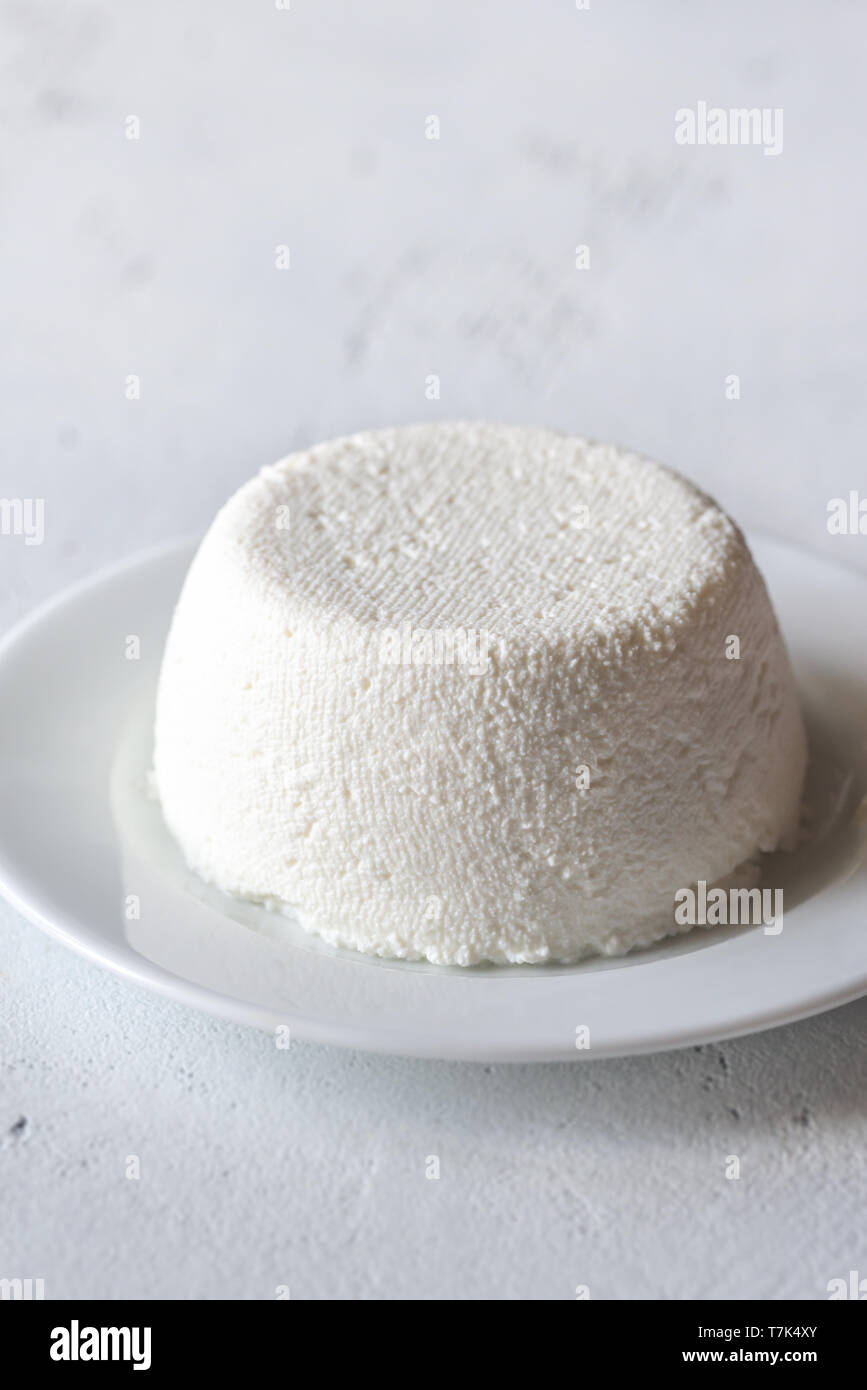 Ricotta - Italian whey cheese on white background Stock Photo - Alamy