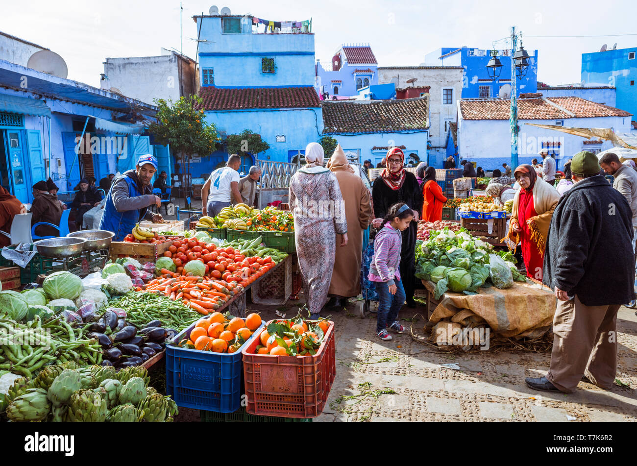 Chefchaouen, Morocco : Moroccan people shop for fruit and vegetables at ...