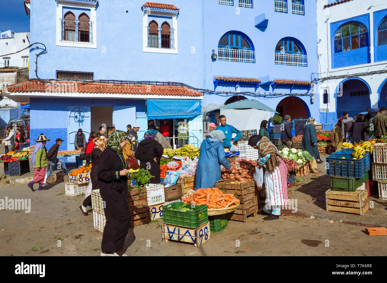 Chefchaouen, Morocco : Moroccan women shop for fruit and vegetables at ...