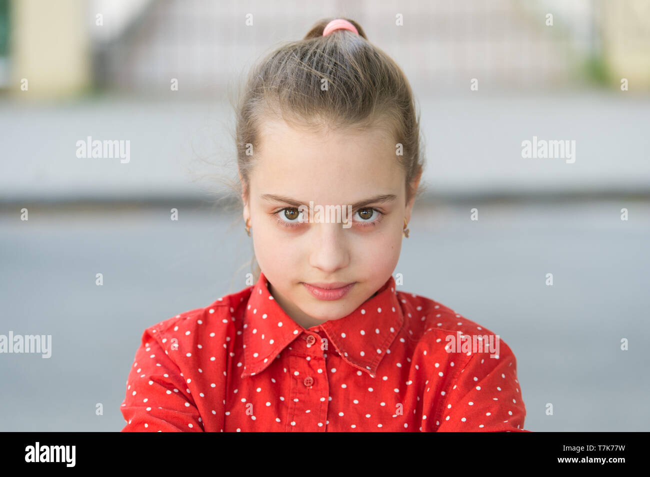 Pretty serious. Girl carefree child. International childrens day ...