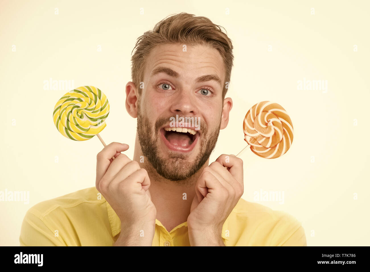 Impressing fact sugar nutrition. Man handsome bearded guy holds ...