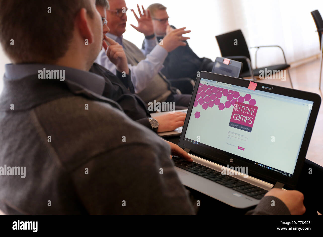Cologne, Germany. 08th May, 2019. Candidate priests sit with laptop in ...