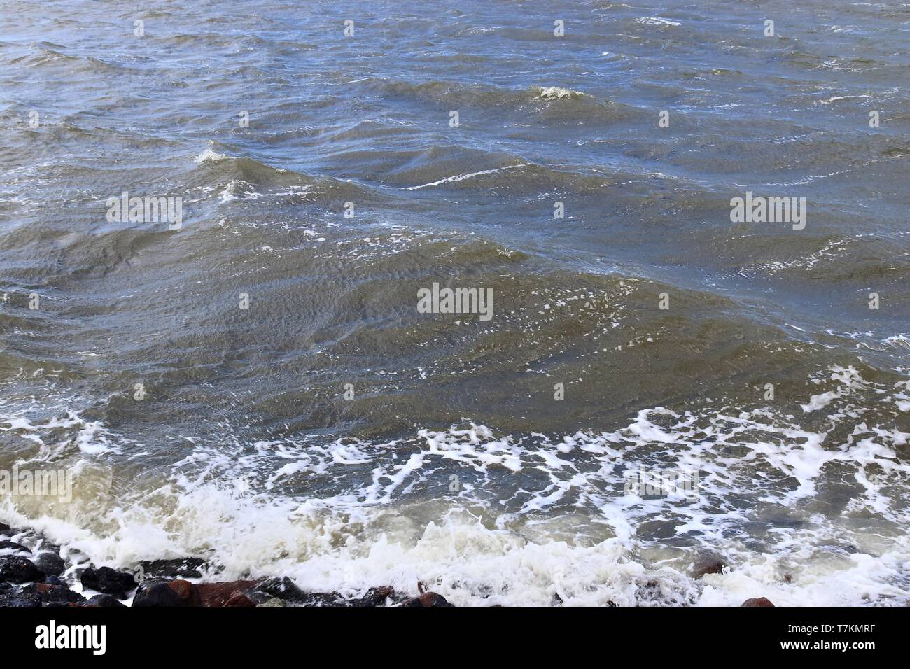 Close up surface of floating water with ripples and waves and some ...