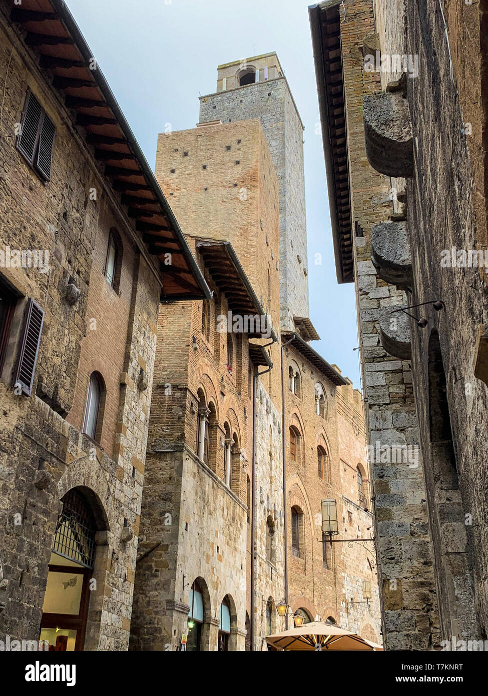 View of San Gimignano, an Italian medieval village with characteristic ...