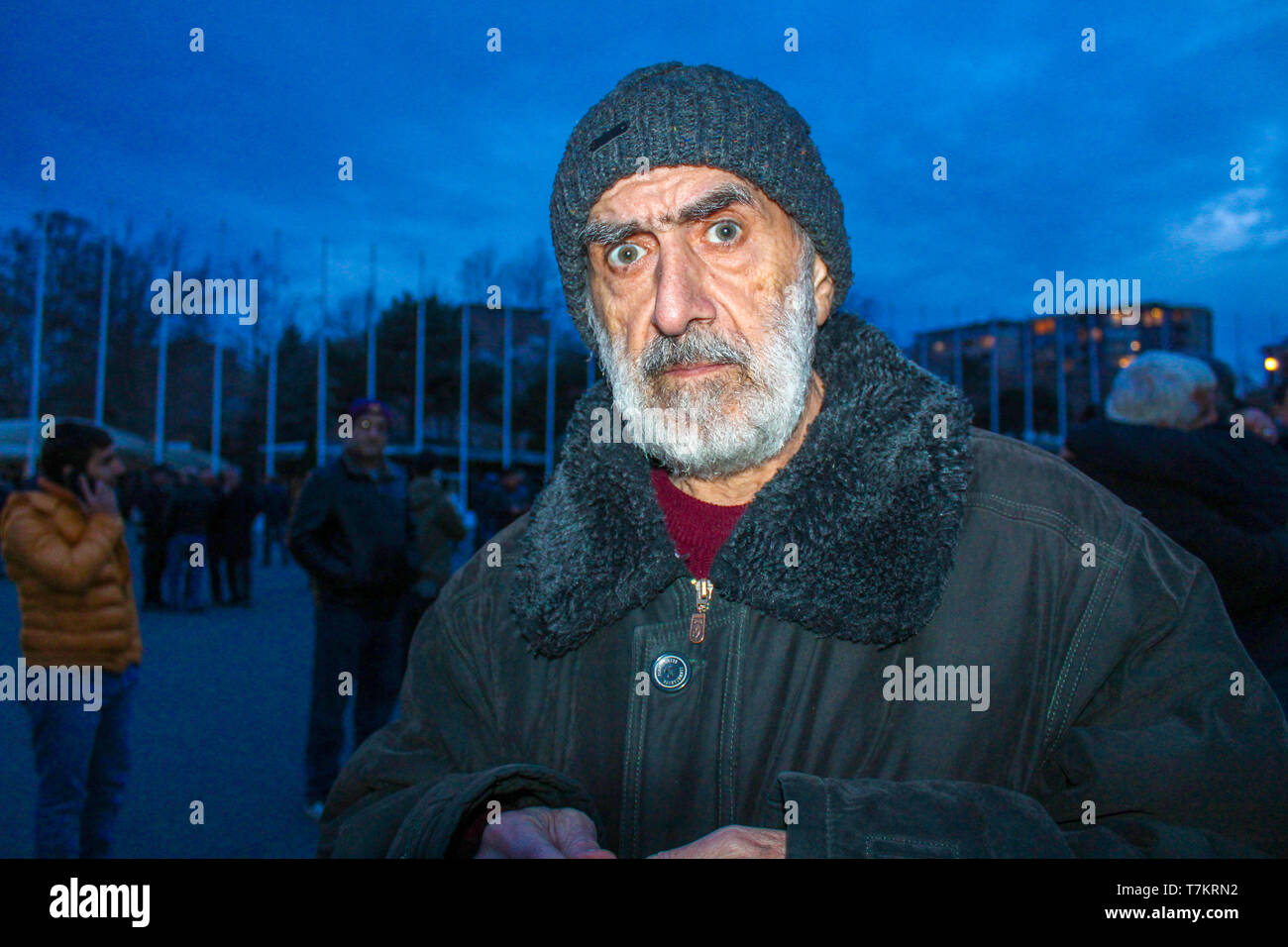 Elderly man at protests in Armenia Stock Photo - Alamy