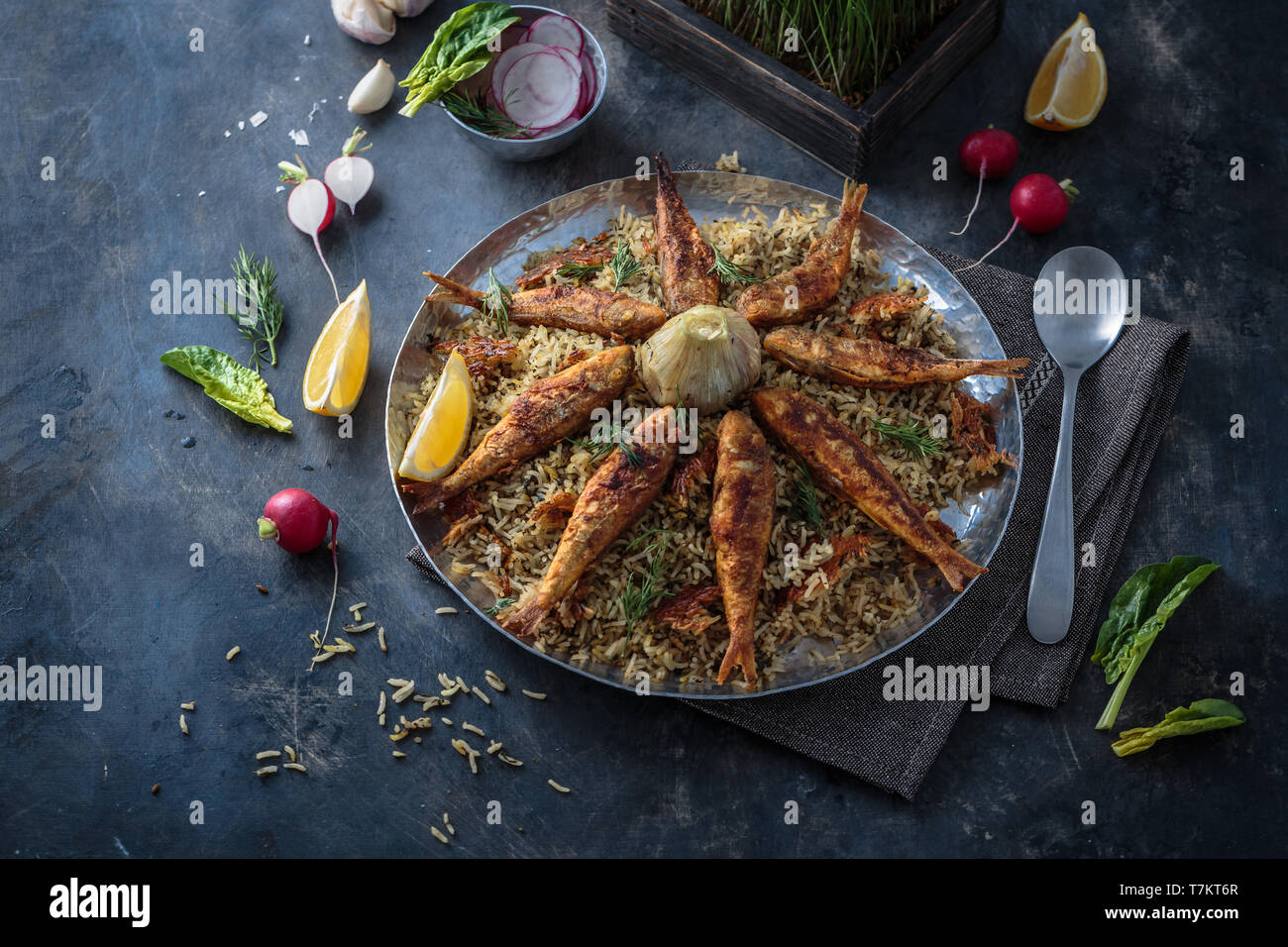 Rice pilaf with different herbs and fish. persian cuisine Stock Photo ...
