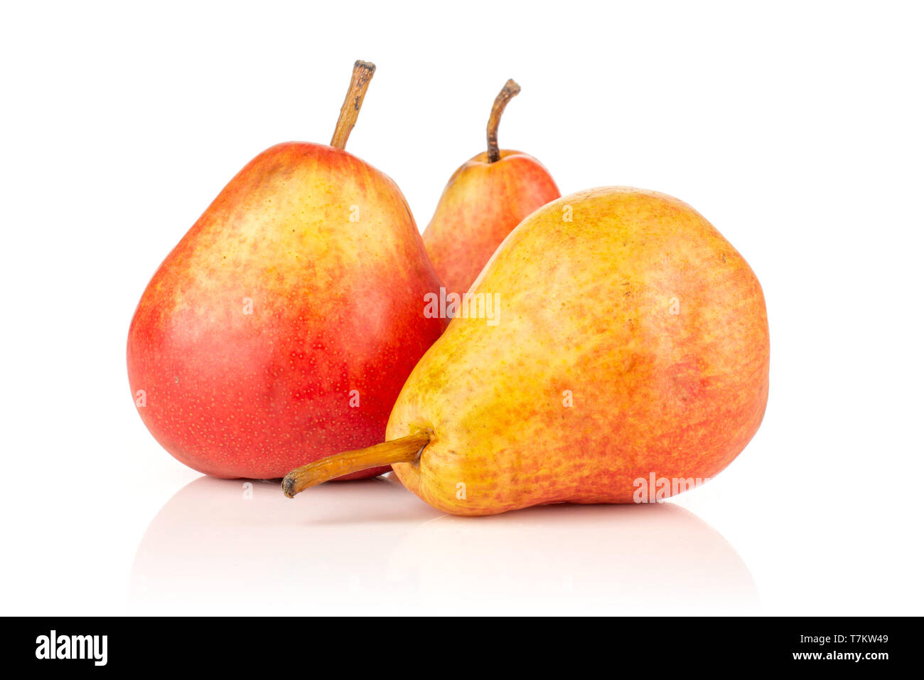 Group of three whole fresh red pear isolated on white background Stock ...