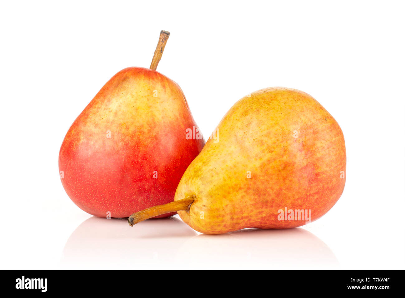 Group of two whole juicy fresh red pear isolated on white background ...