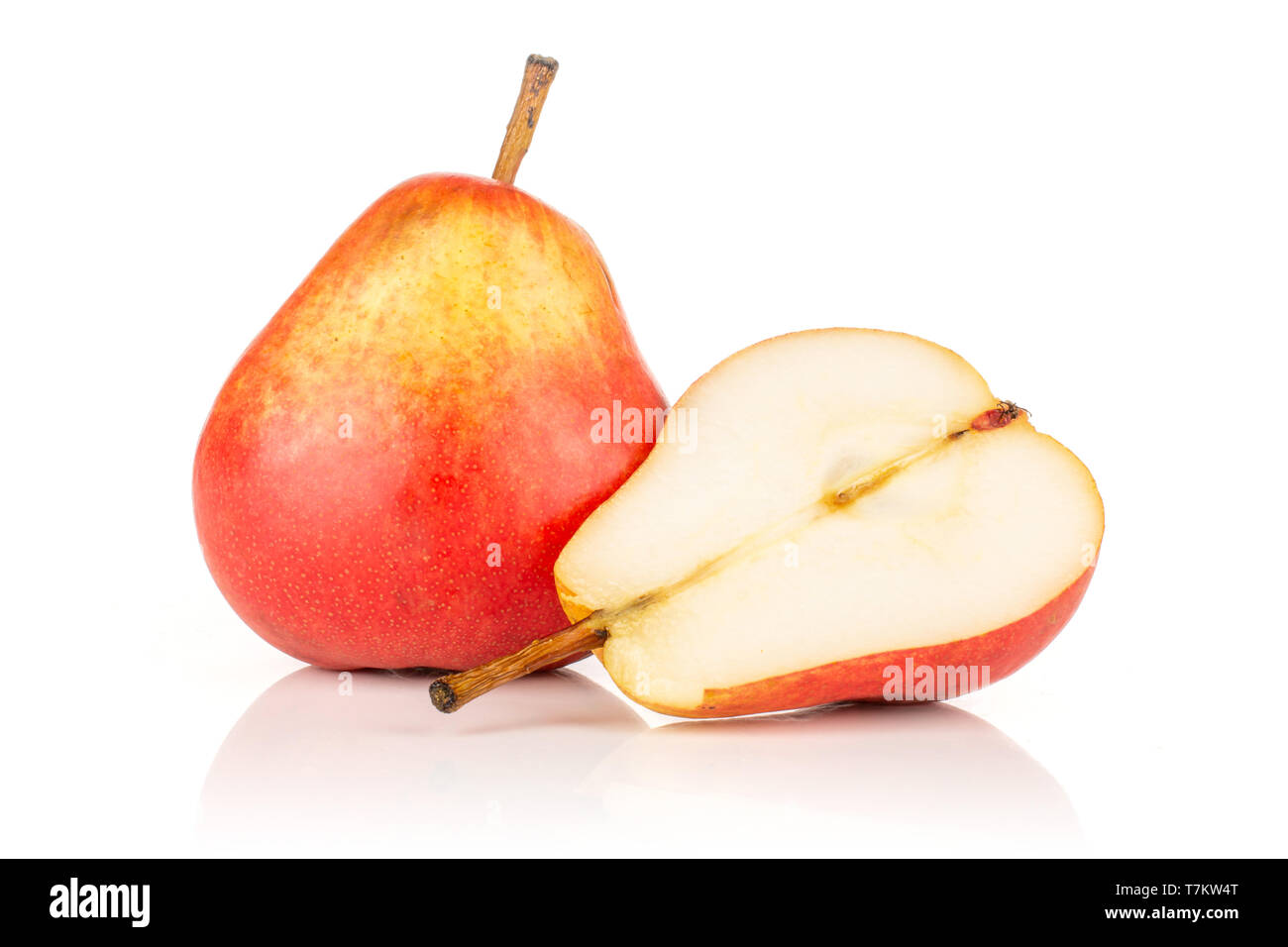 Group of one whole one half of fresh red pear isolated on white ...