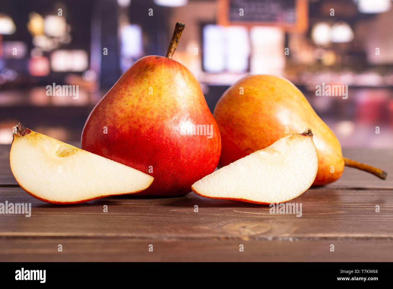 Group of two whole two slices of fresh red pear in a restaurant Stock ...