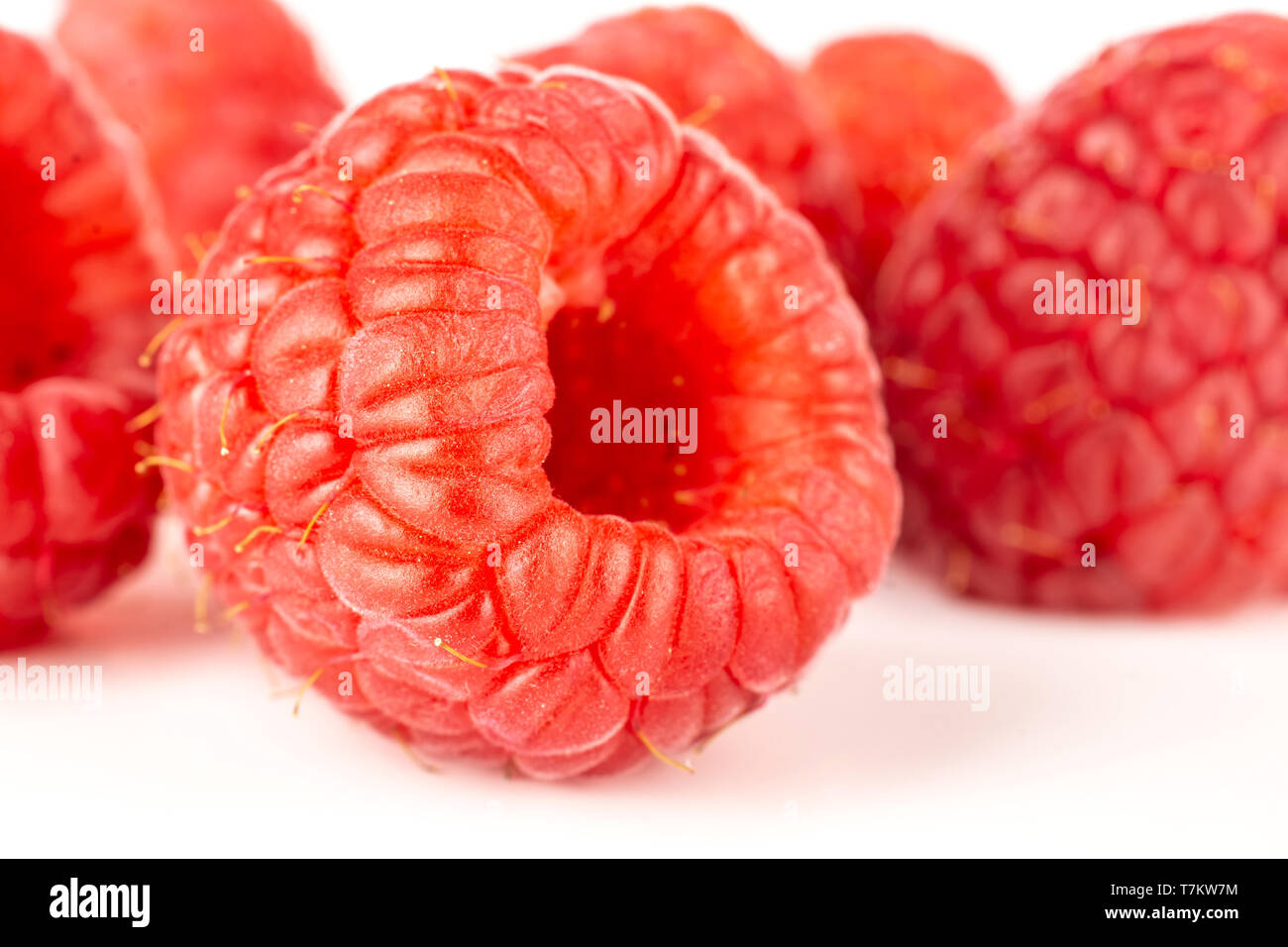 Lot of whole fresh red raspberry isolated on white background Stock ...