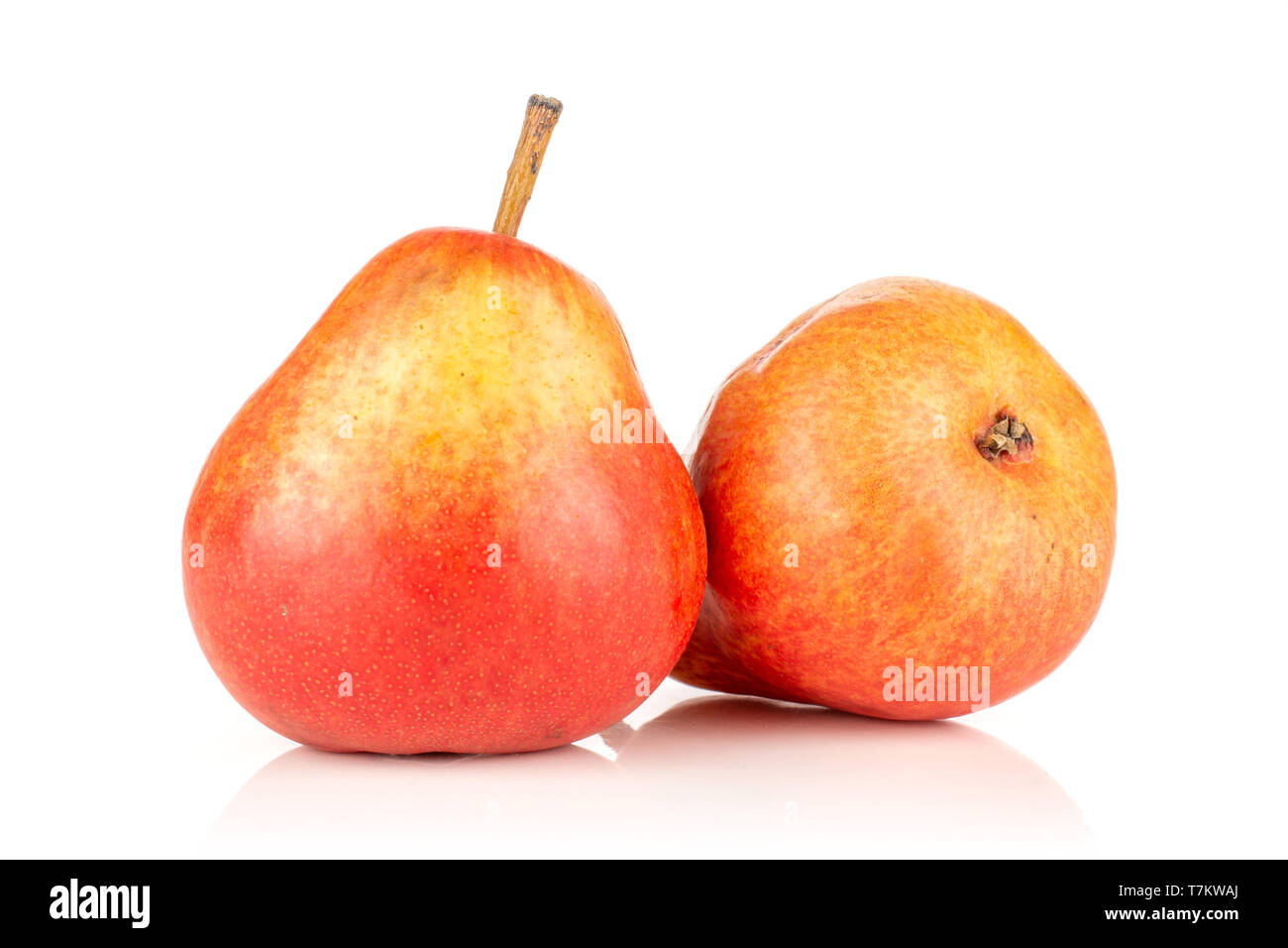 Group of two whole fresh red pear isolated on white background Stock ...