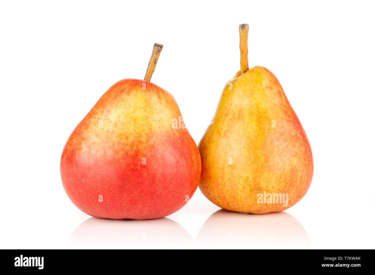 Group of two whole ripe fresh red pear isolated on white background ...