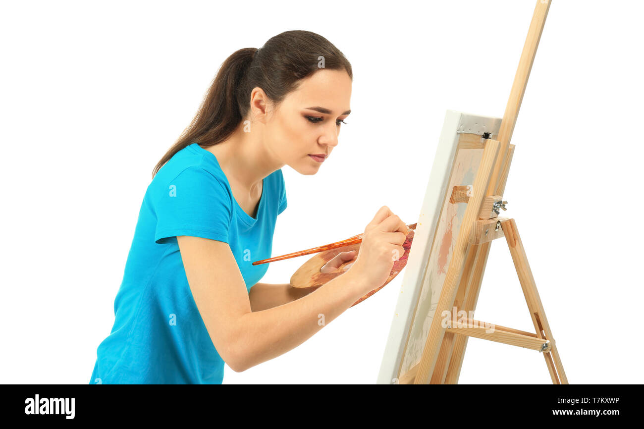 Female artist painting picture on white background Stock Photo - Alamy