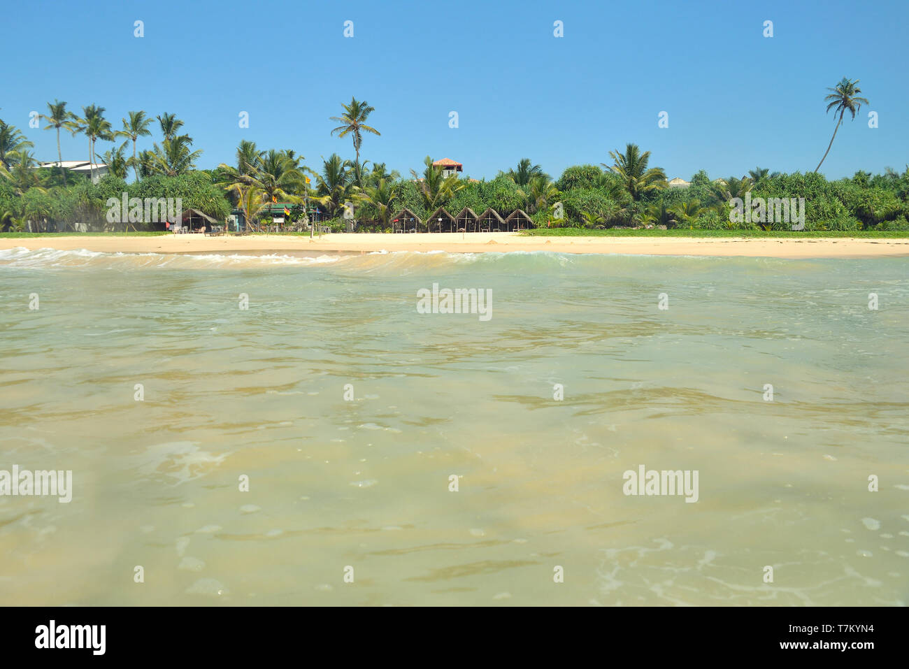 tropical beach view from ocean Stock Photo - Alamy