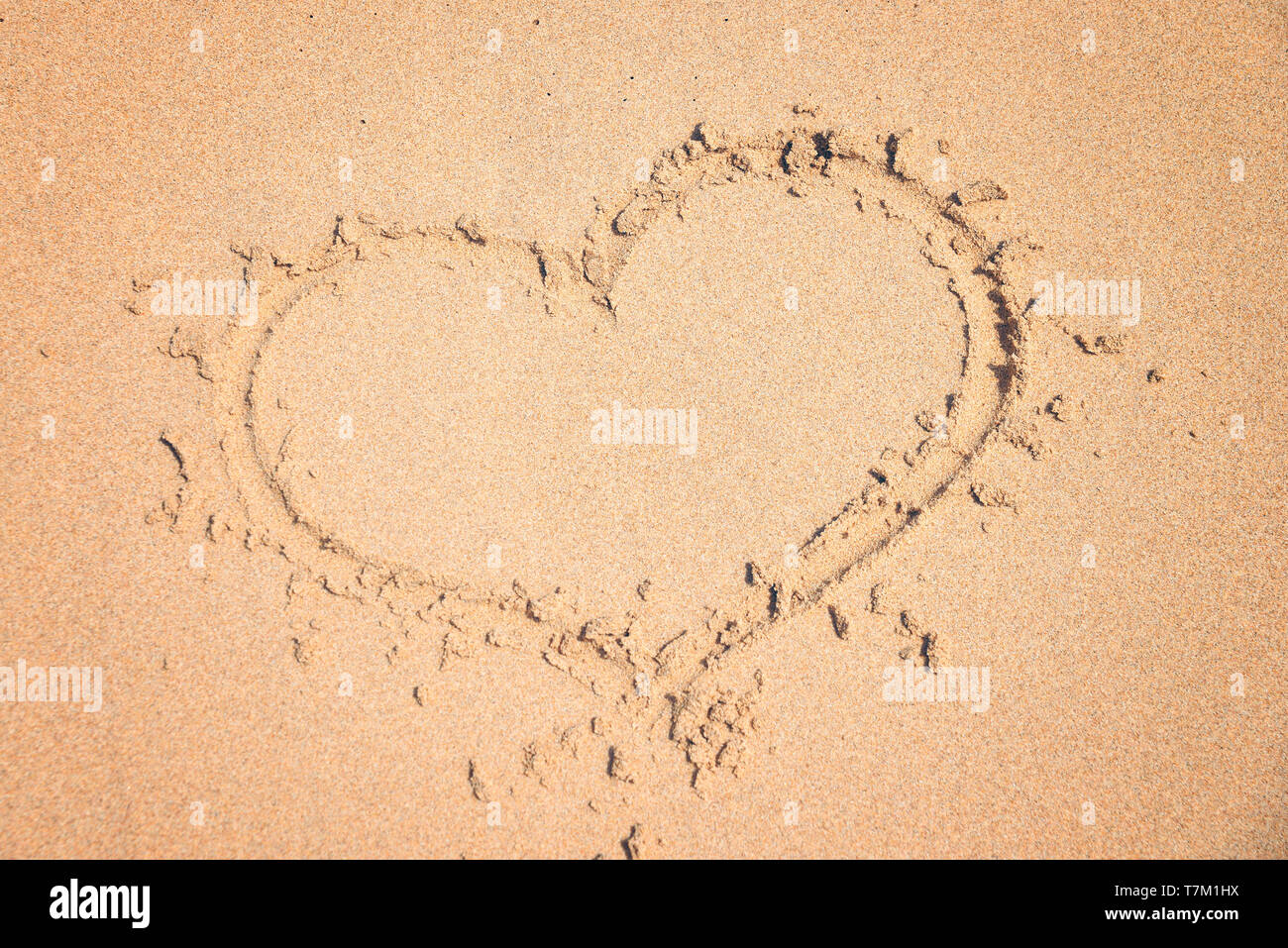 Love written on sand beach hi-res stock photography and images - Alamy