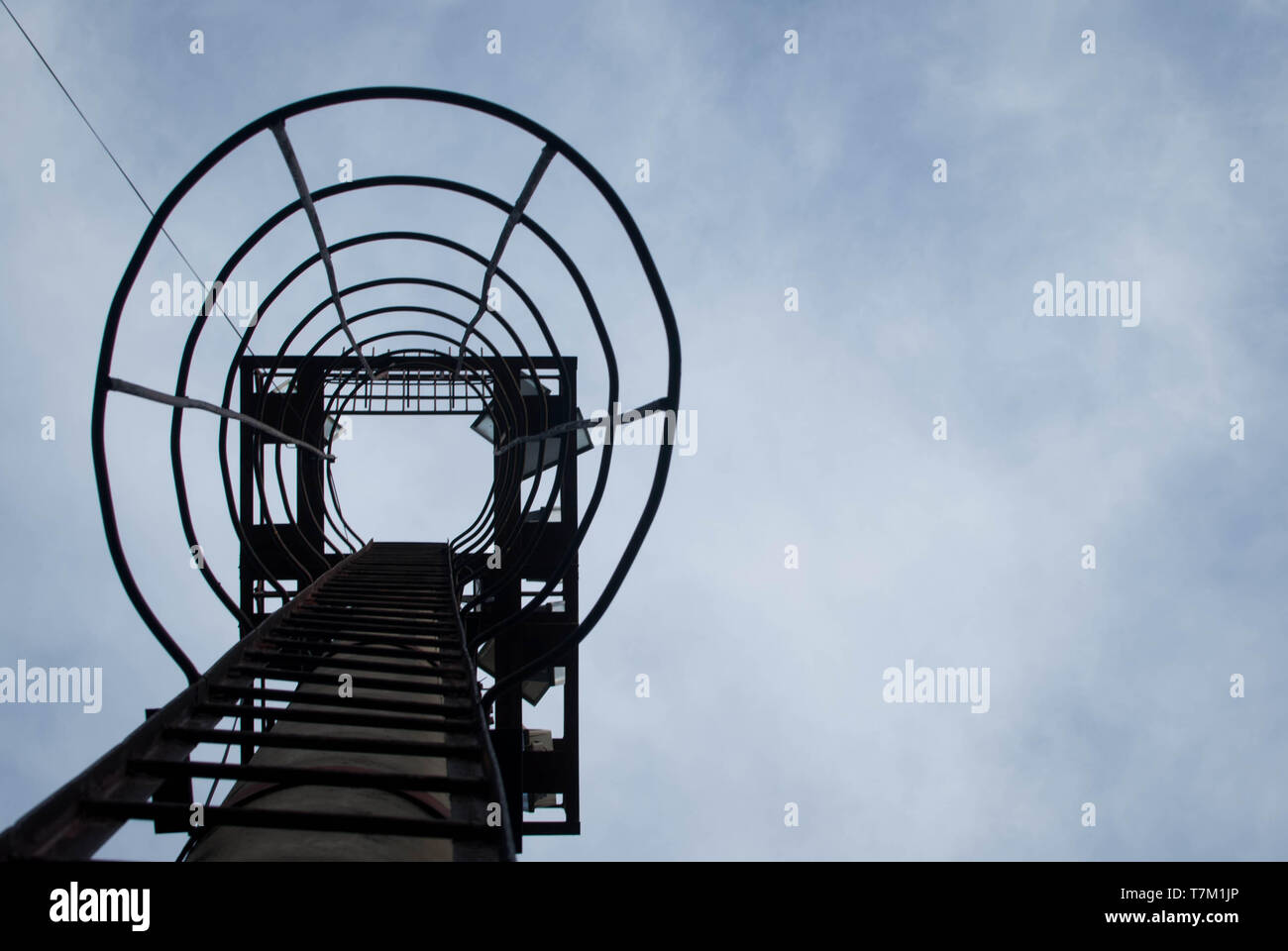 Fire emergency escape ladder on a building vertical angle Stock Photo ...