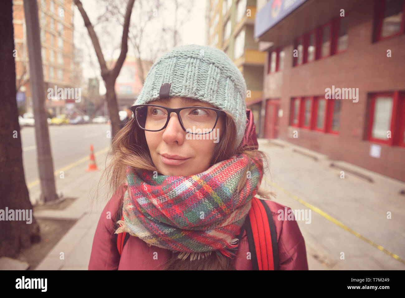 girl in a hat and glasses Stock Photo - Alamy