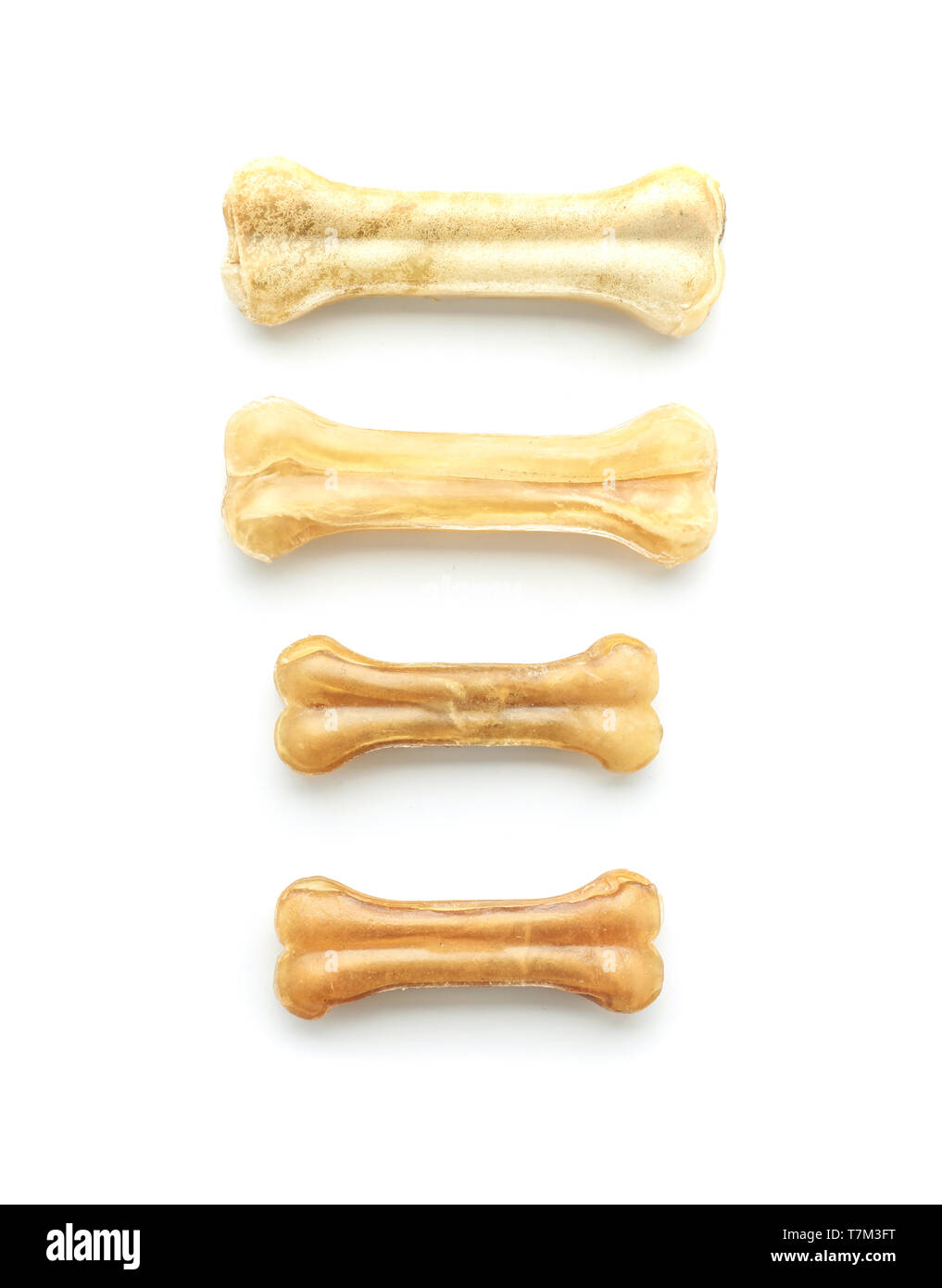 Chew bones for dog on white background Stock Photo - Alamy